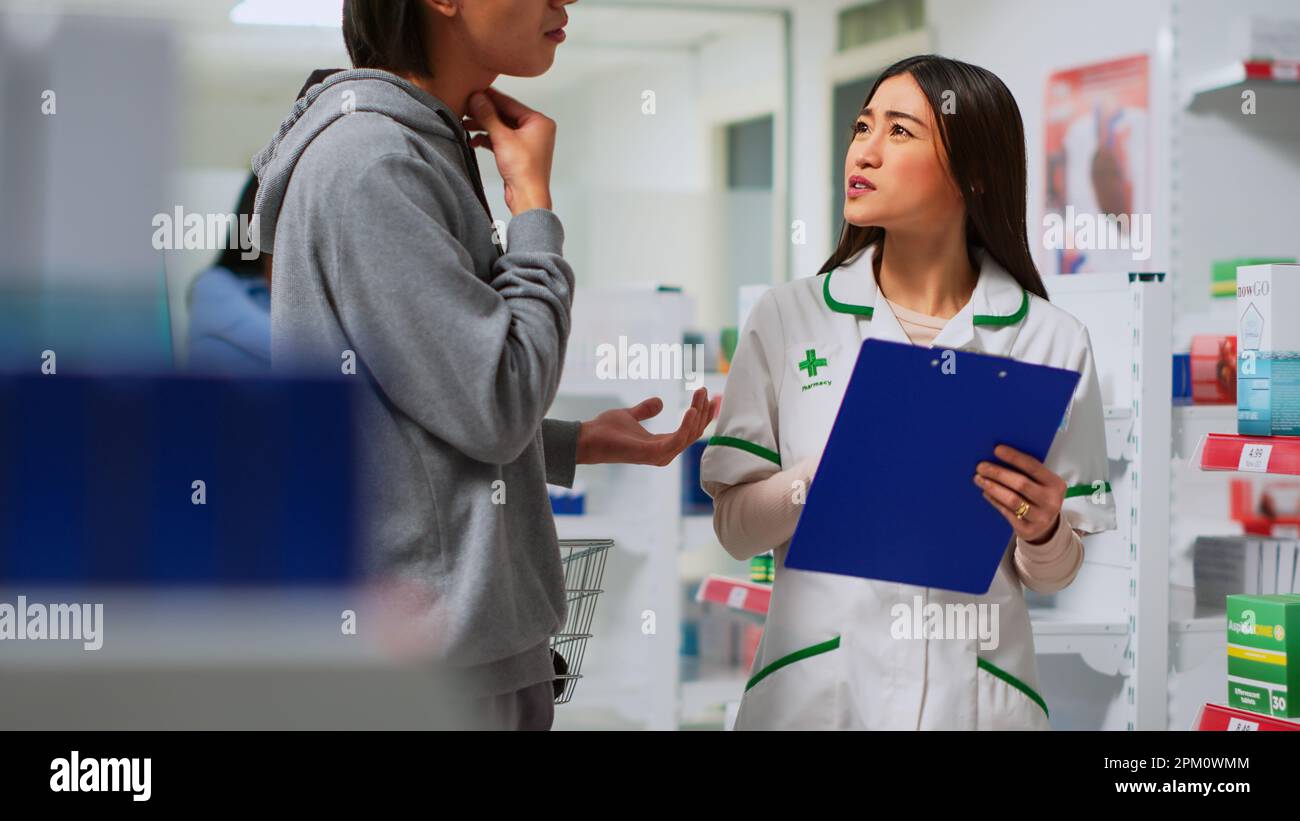 Asking pharmacist for cure hi-res stock photography and images - Alamy