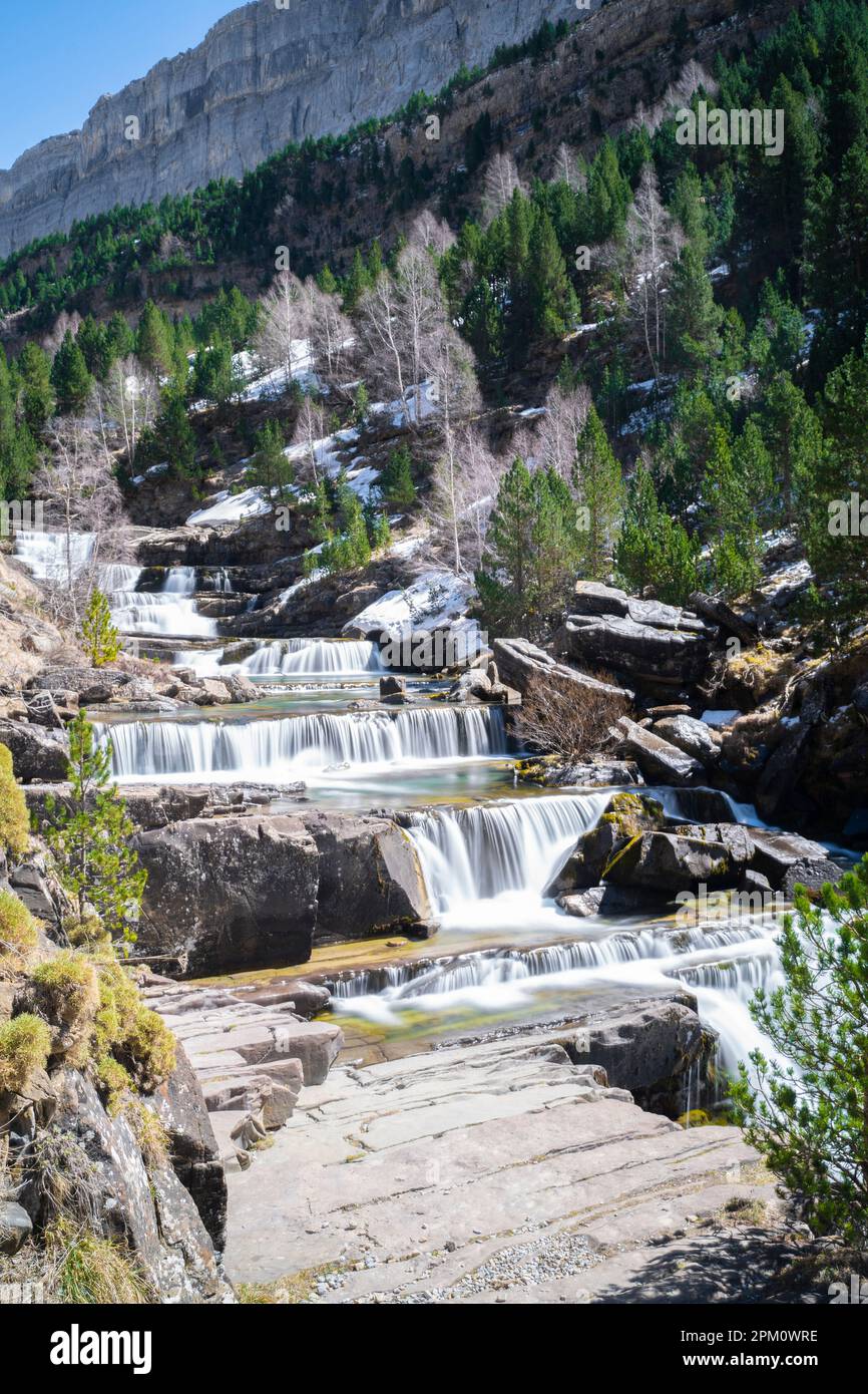 waterfall in the river in Ordesa National Park in the spanish Pyrenees ...