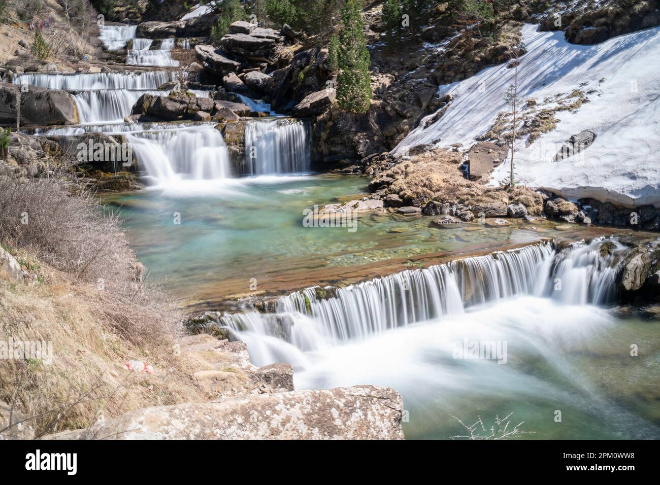 waterfall in the river in Ordesa National Park in the spanish Pyrenees ...