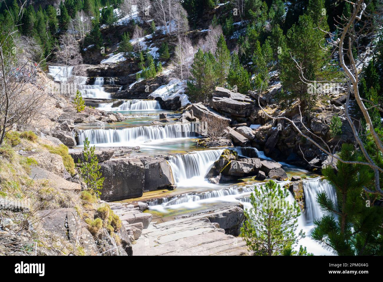 waterfall in the river in Ordesa National Park in the spanish Pyrenees ...