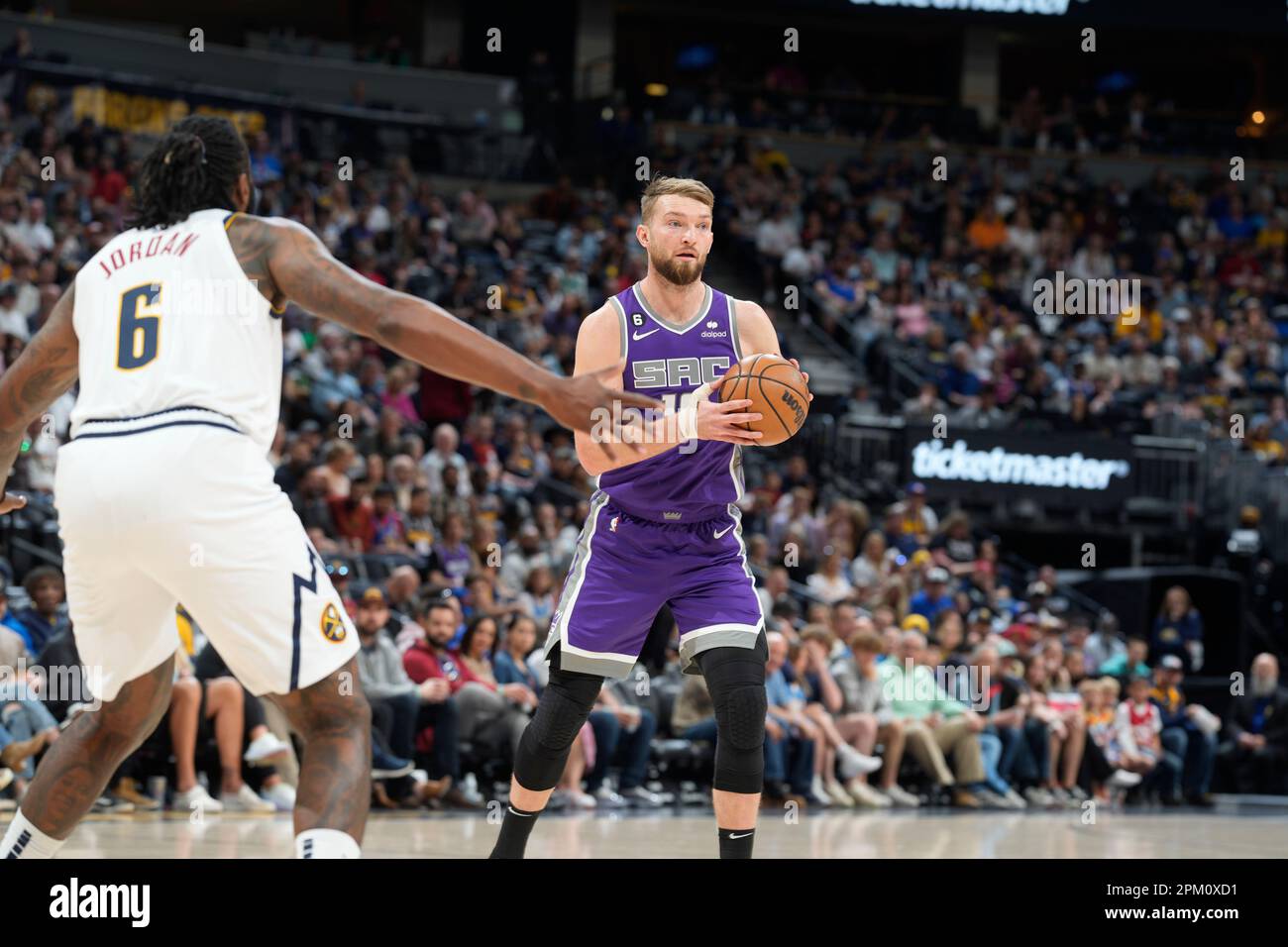 Sacramento Kings forward Domantas Sabonis (10) and Denver Nuggets center DeAndre Jordan (6) in ...