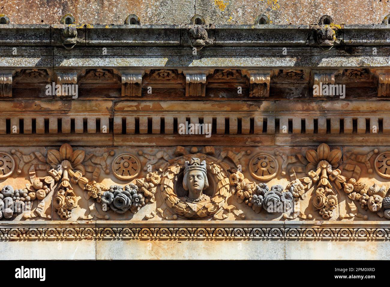 Queen Victoria peeps out of the frieze of Langside Hall. Formerly the ...