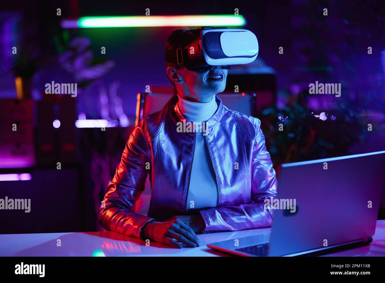 Neon metaverse futuristic concept. trendy woman in vr headset in modern ...