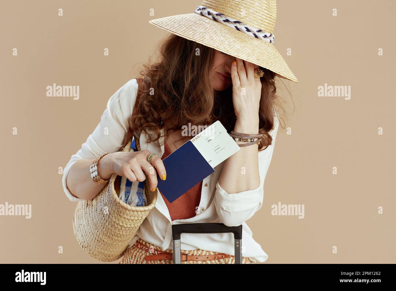 Beach vacation. stressed stylish woman in white blouse and shorts ...