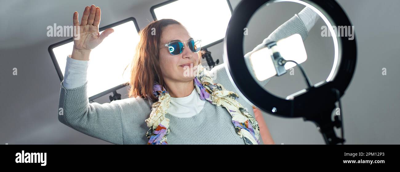 Portrait of stylish good-looking female blogger, lifestyle internet ...