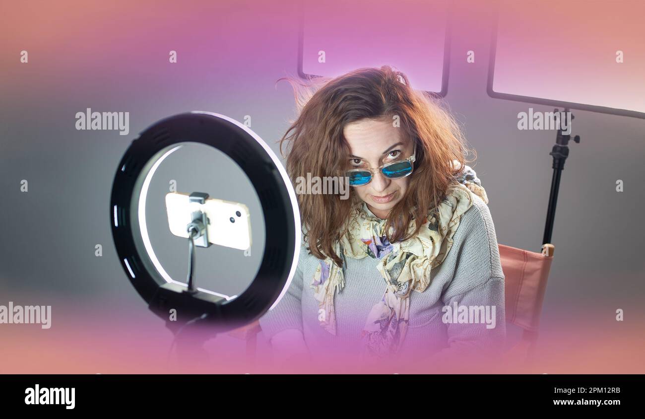 Portrait of stylish good-looking female blogger, lifestyle internet ...