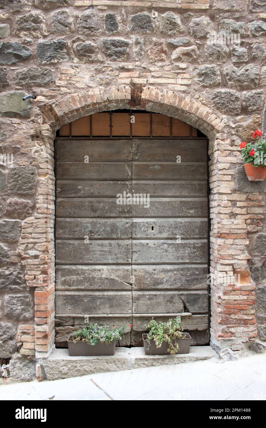 Ancient wood front door of a old medieval house Stock Photo - Alamy