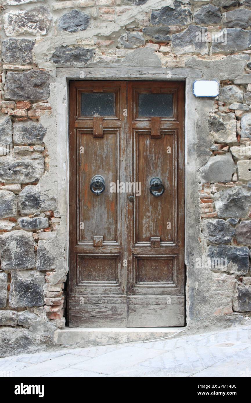 Wooden medieval squared style front door Stock Photo - Alamy