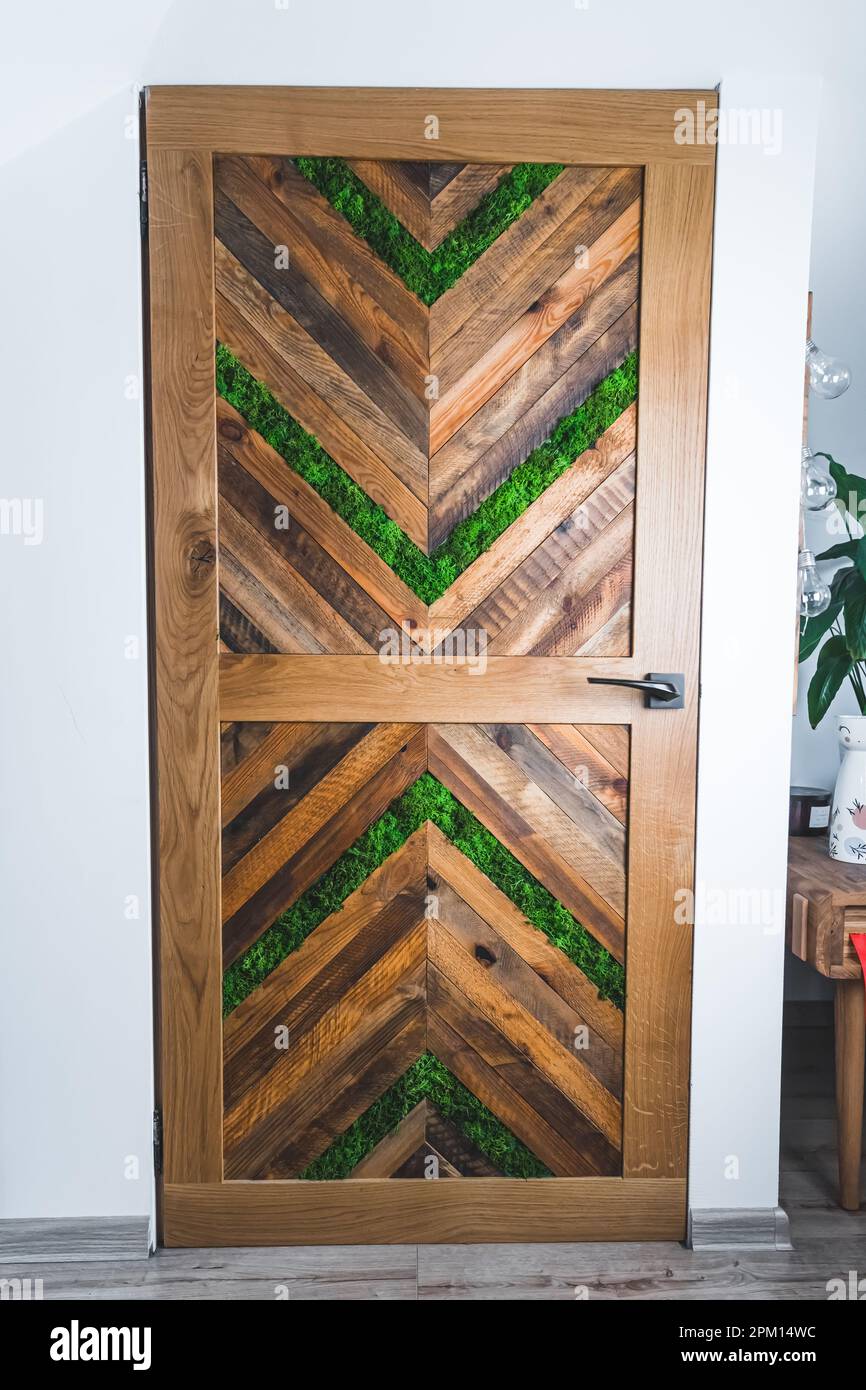 Stunning wooden and moss artistic door made by carpenter at woodwork ...