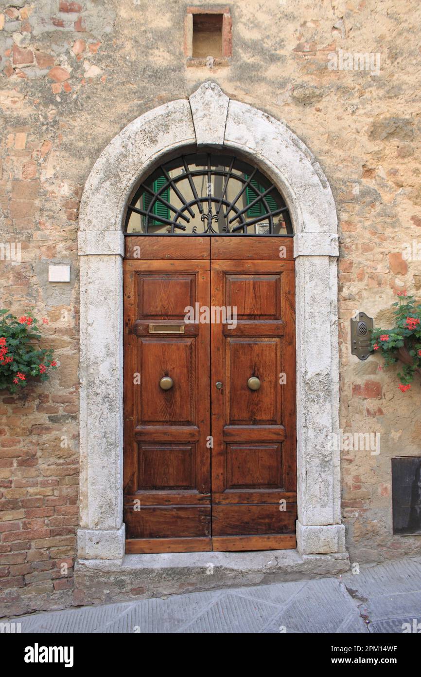 Renaissance and inlayed front door with grate Stock Photo - Alamy