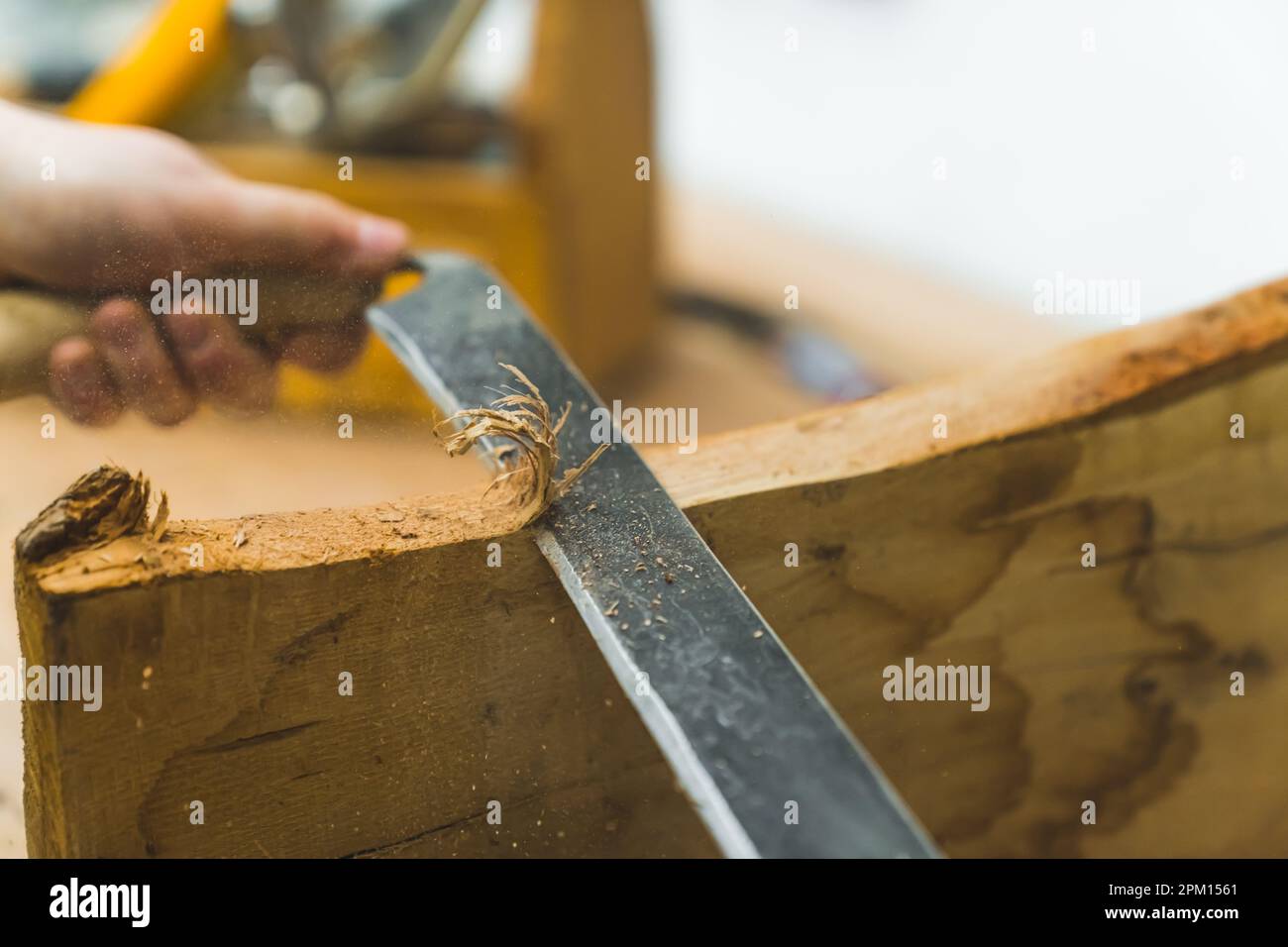 Closeup shot of traditional woodworking hand tool - drawshave - used by ...