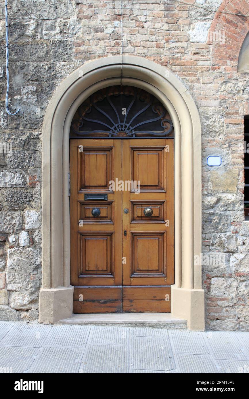 Renaissance and inlayed front door with grate Stock Photo - Alamy