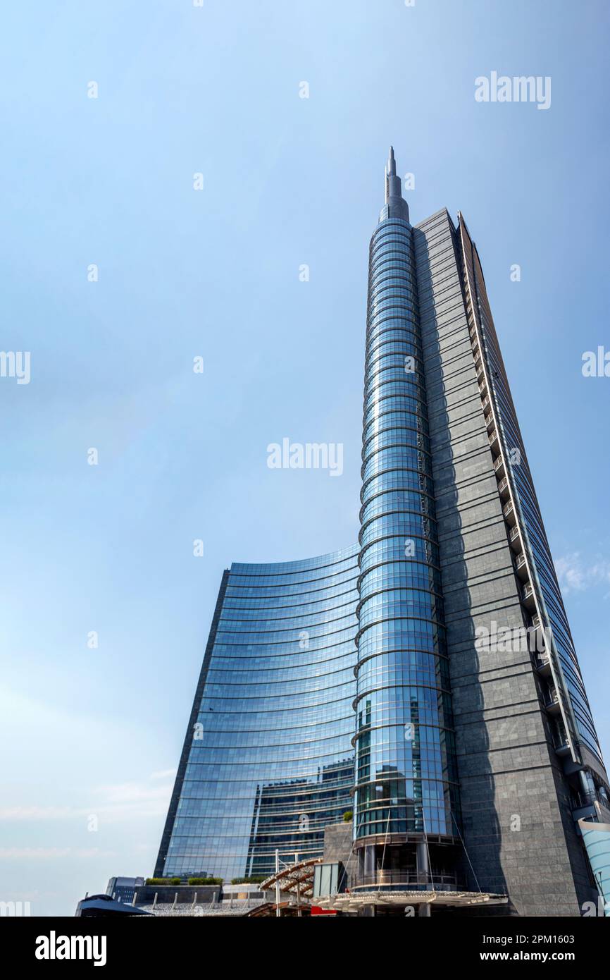 The towering industrial skyscraper stands tall above the city skyline ...