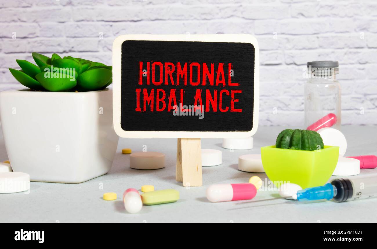 Hormone growth hormone written on notebook. Test tubes and hormones ...