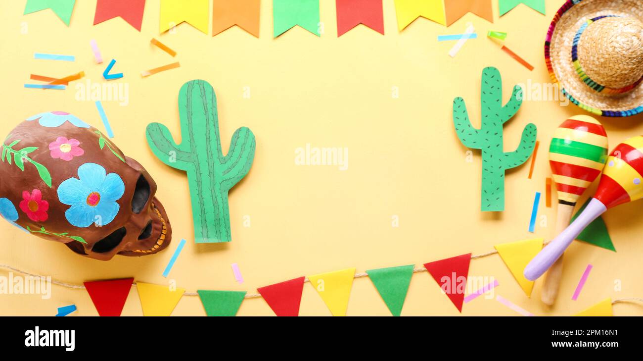 Mexican composition with skull, sombrero, maracas and decor on beige ...