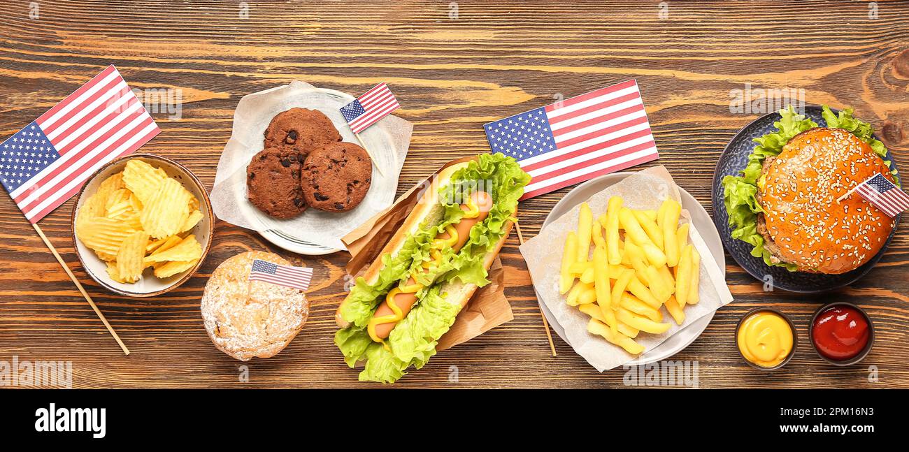 American traditional food with USA flags on wooden background, top view ...