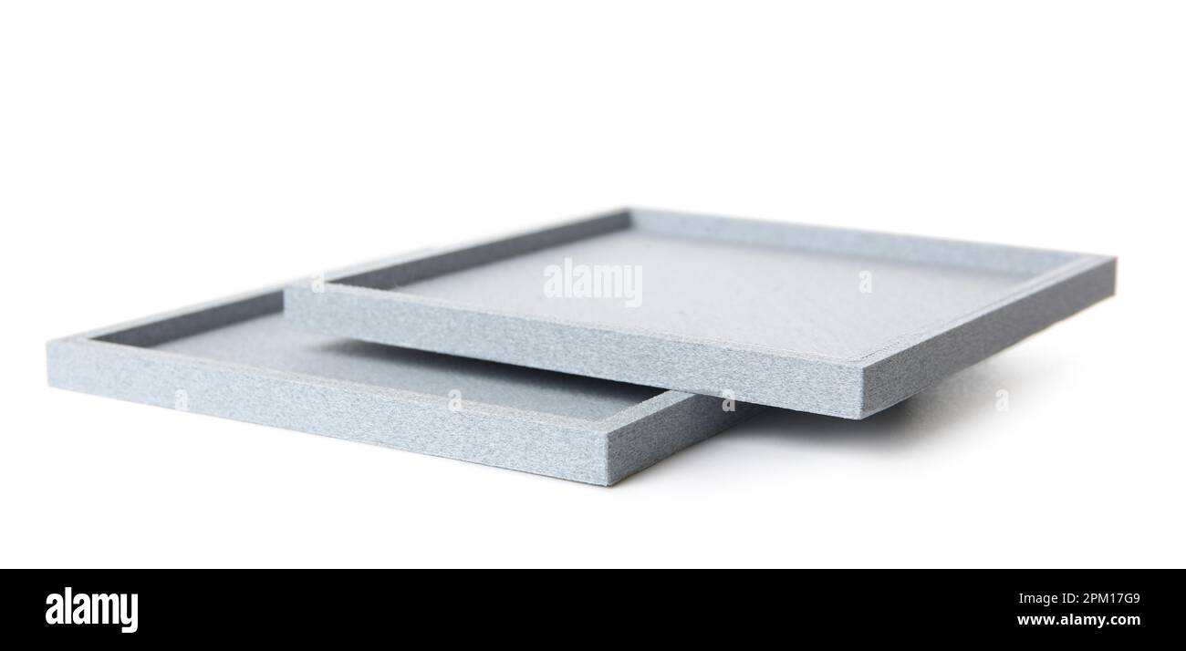 Decorative plaster trays isolated on white background Stock Photo - Alamy