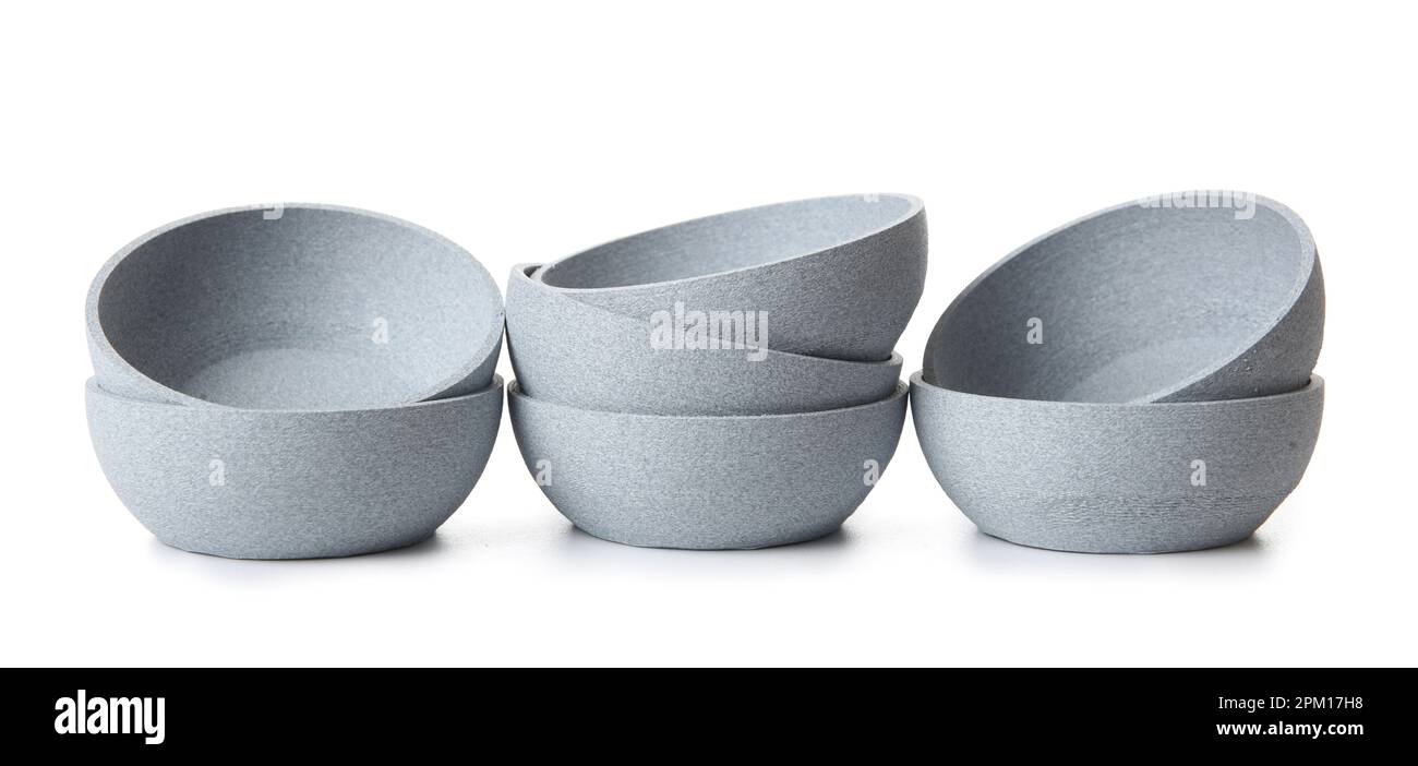 Decorative plaster bowls isolated on white background Stock Photo - Alamy