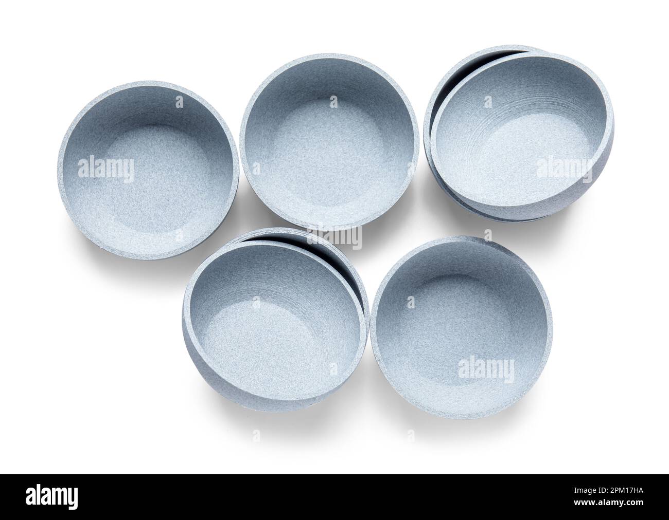 Decorative plaster bowls isolated on white background Stock Photo - Alamy