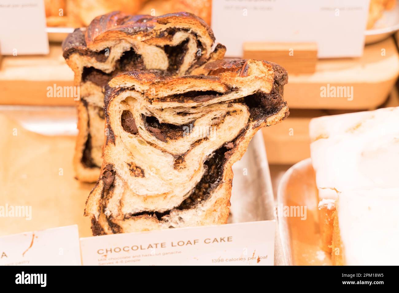 patterns of slices of chocolate load cakes at restaurant London England ...