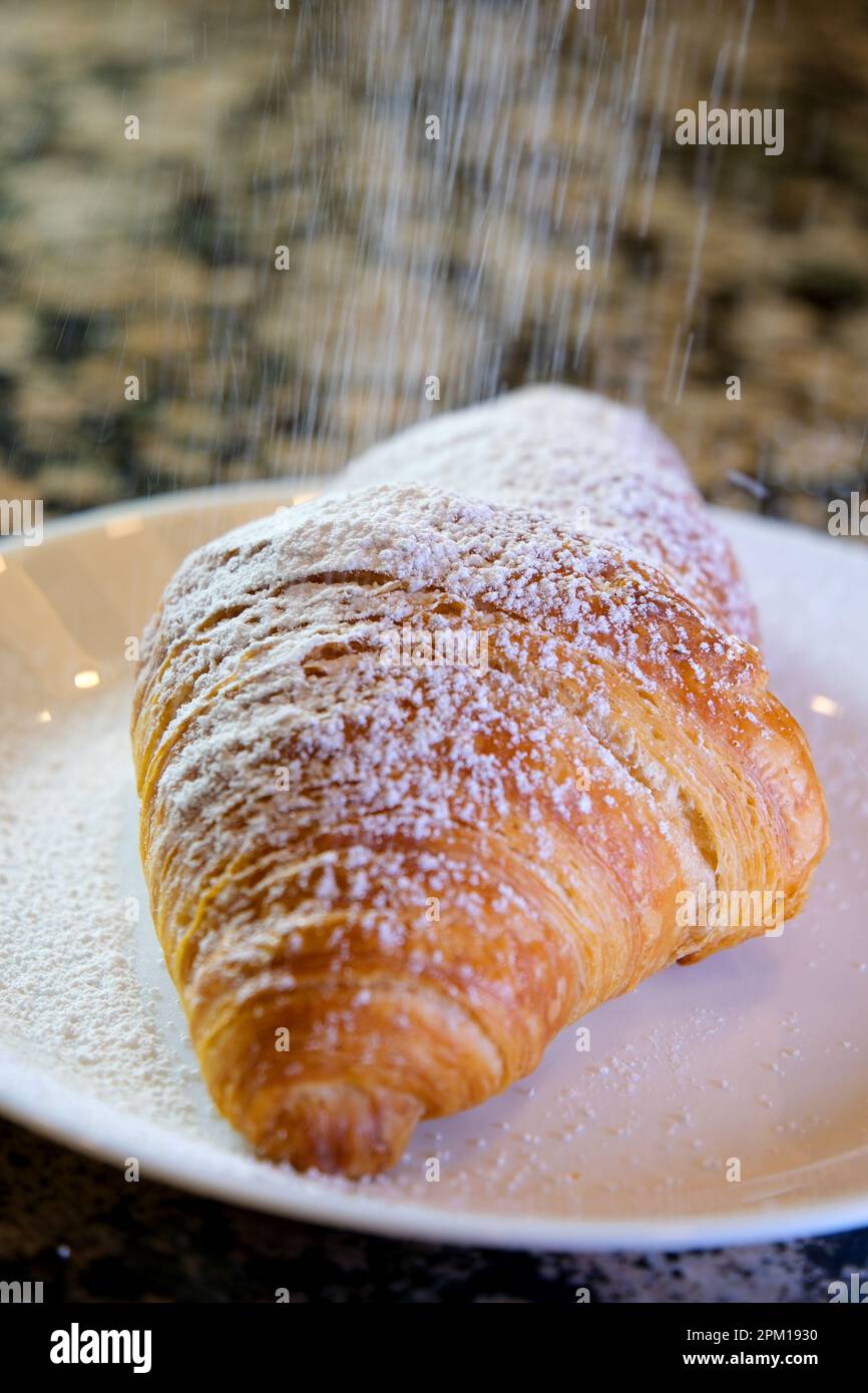 Sprinkling powdered sugar in slow hi-res stock photography and images ...