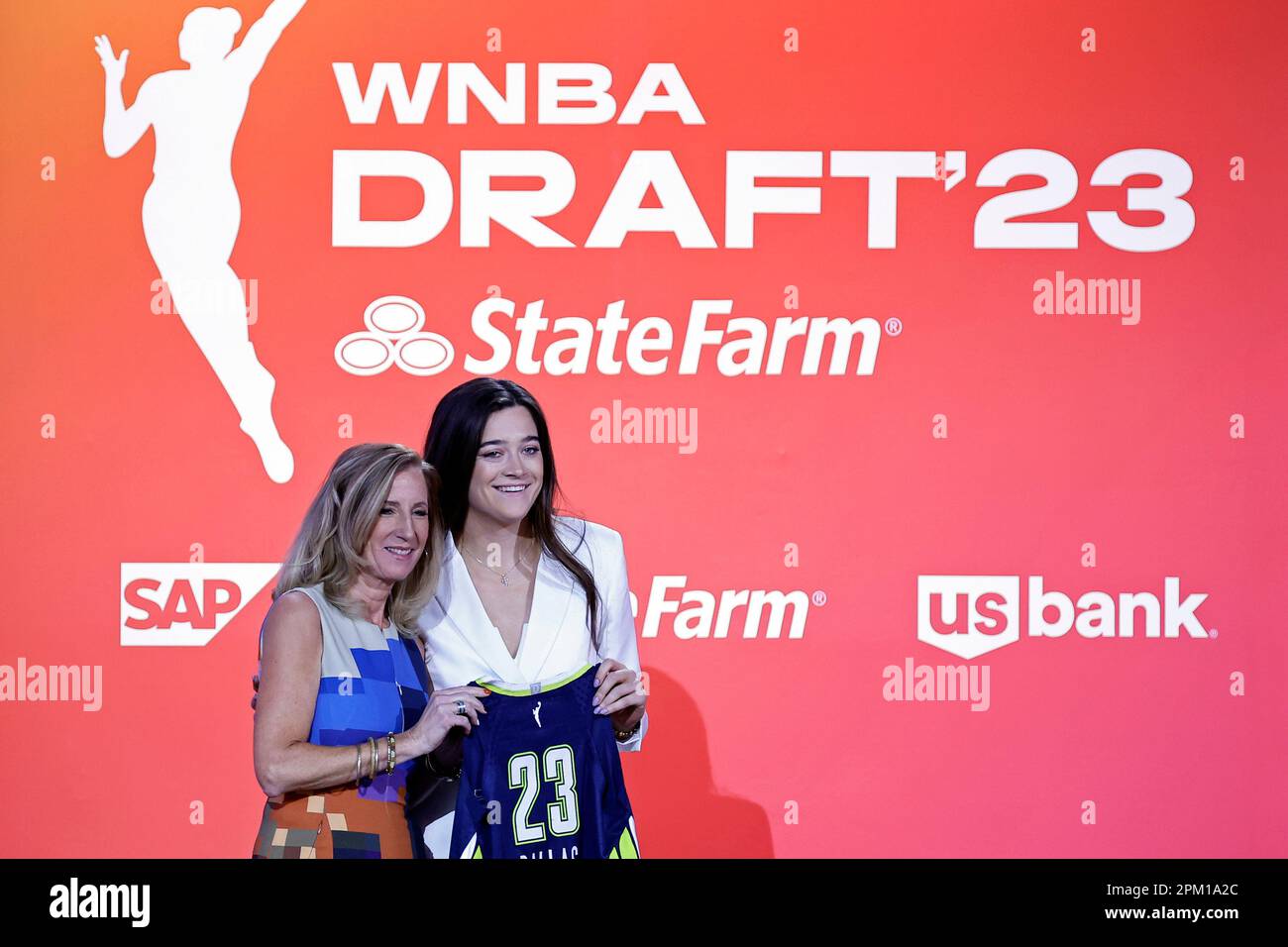 Villanova's Maddy Siegrist, right, poses for a photo with commissioner ...