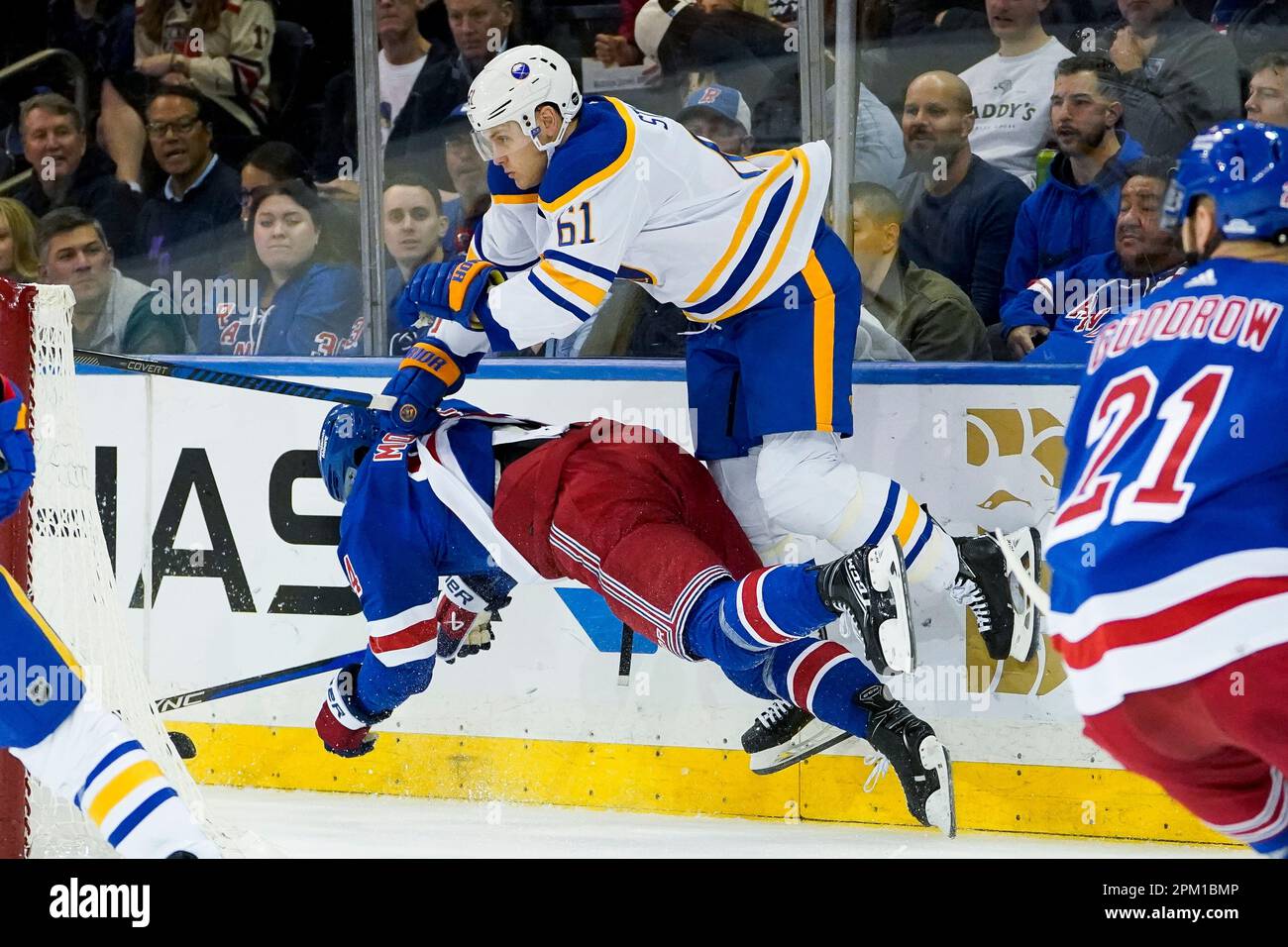 Buffalo Sabres defenseman Riley Stillman (61) checks New York Rangers ... Buffalo Sabres defenseman Riley Stillman (61) checks New York Rangers ...