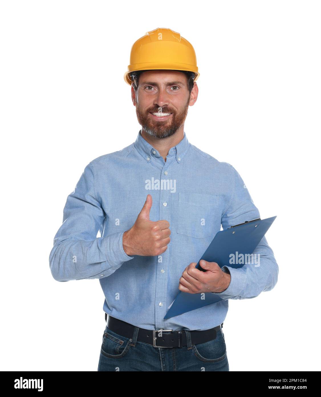 Professional engineer in hard hat with clipboard showing thumb up ...