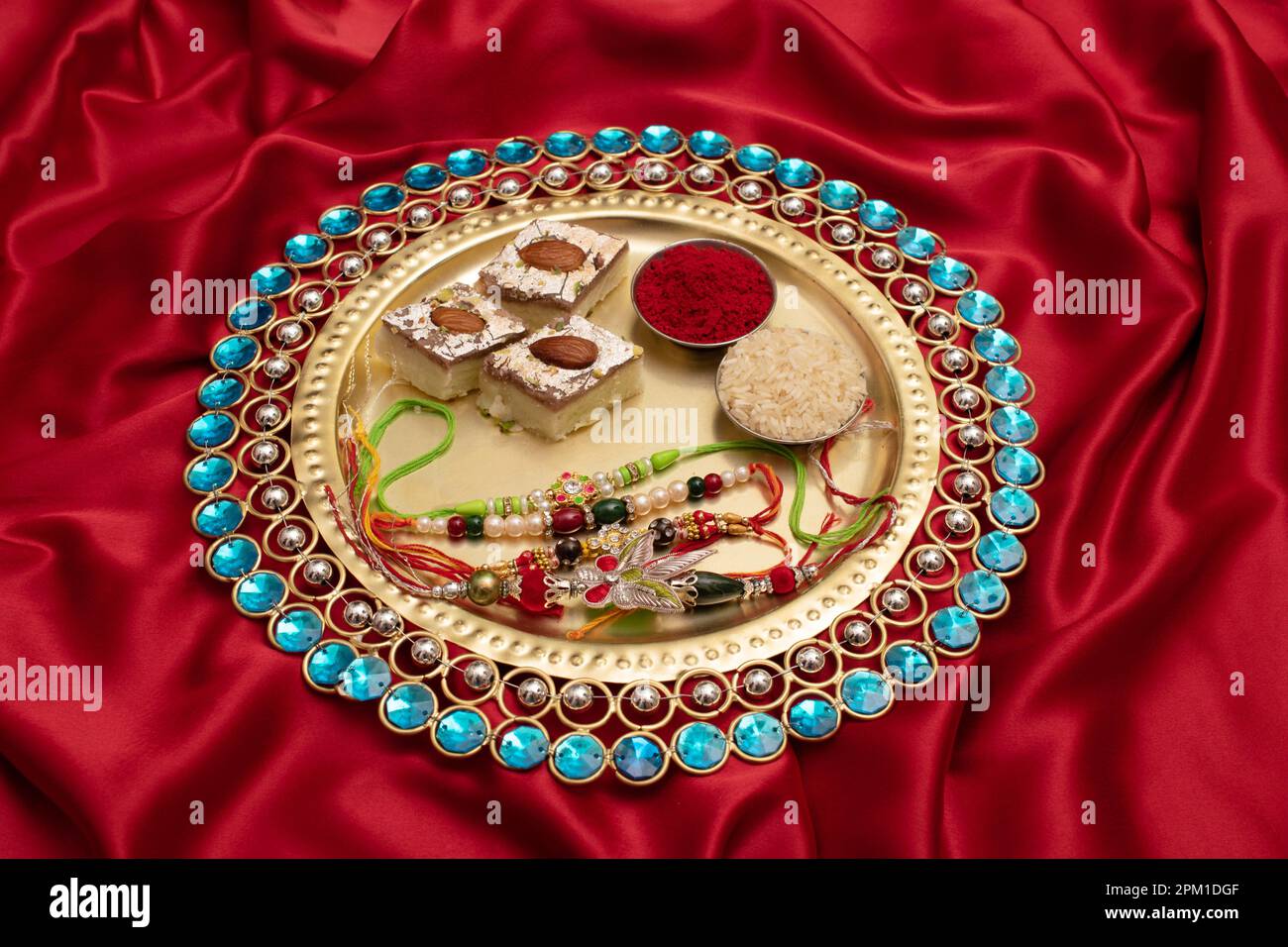 Rakhi with kumkum and sweet for raksha bandhan Stock Photo - Alamy