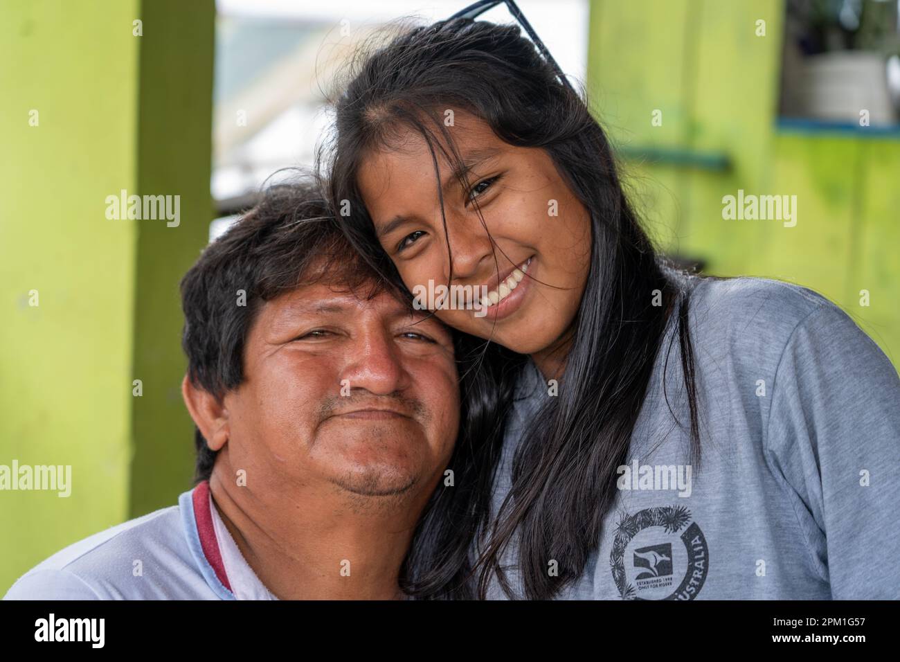 A Father and Daughter Pose Pose for a Photo in the Peruvian Amazon ...