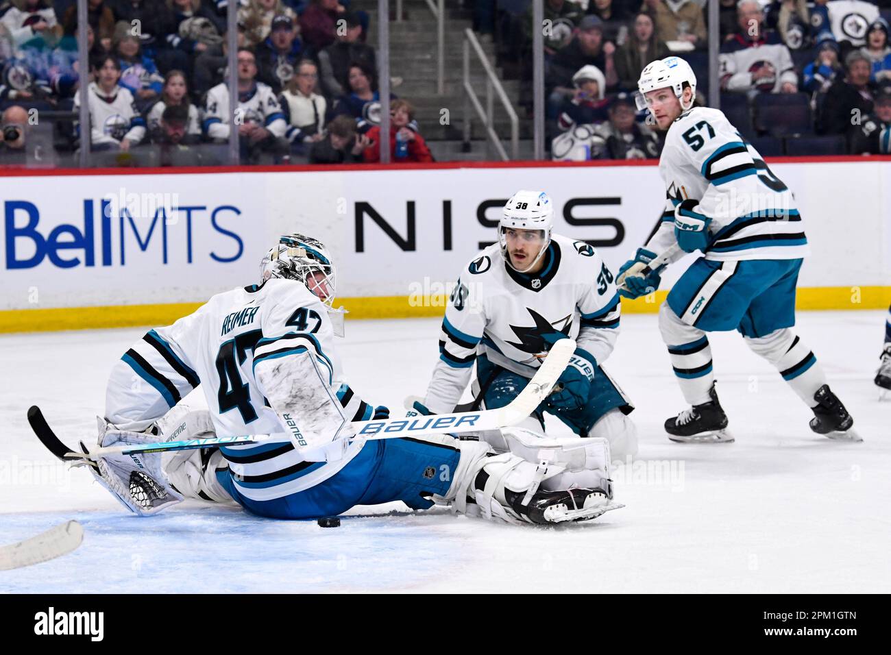 San Jose Sharks goaltender James Reimer (47) makes a save against a ...