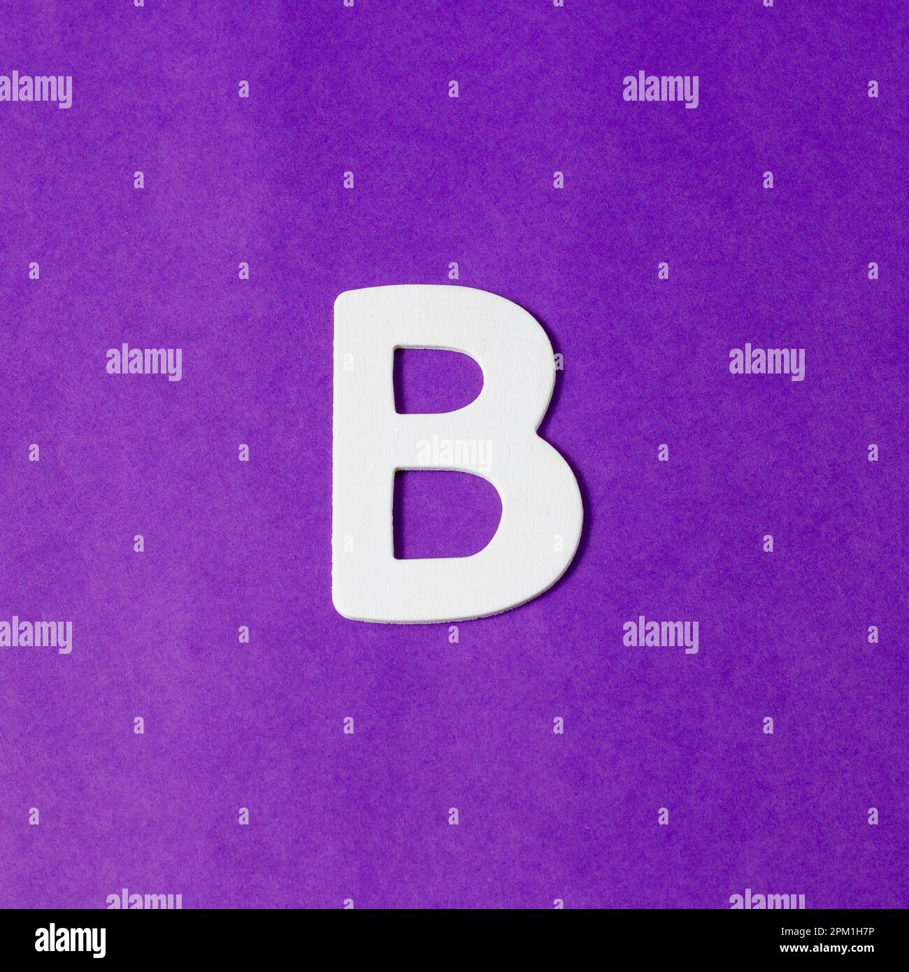 Uppercase letter B - wood texture - Purple background Stock Photo - Alamy