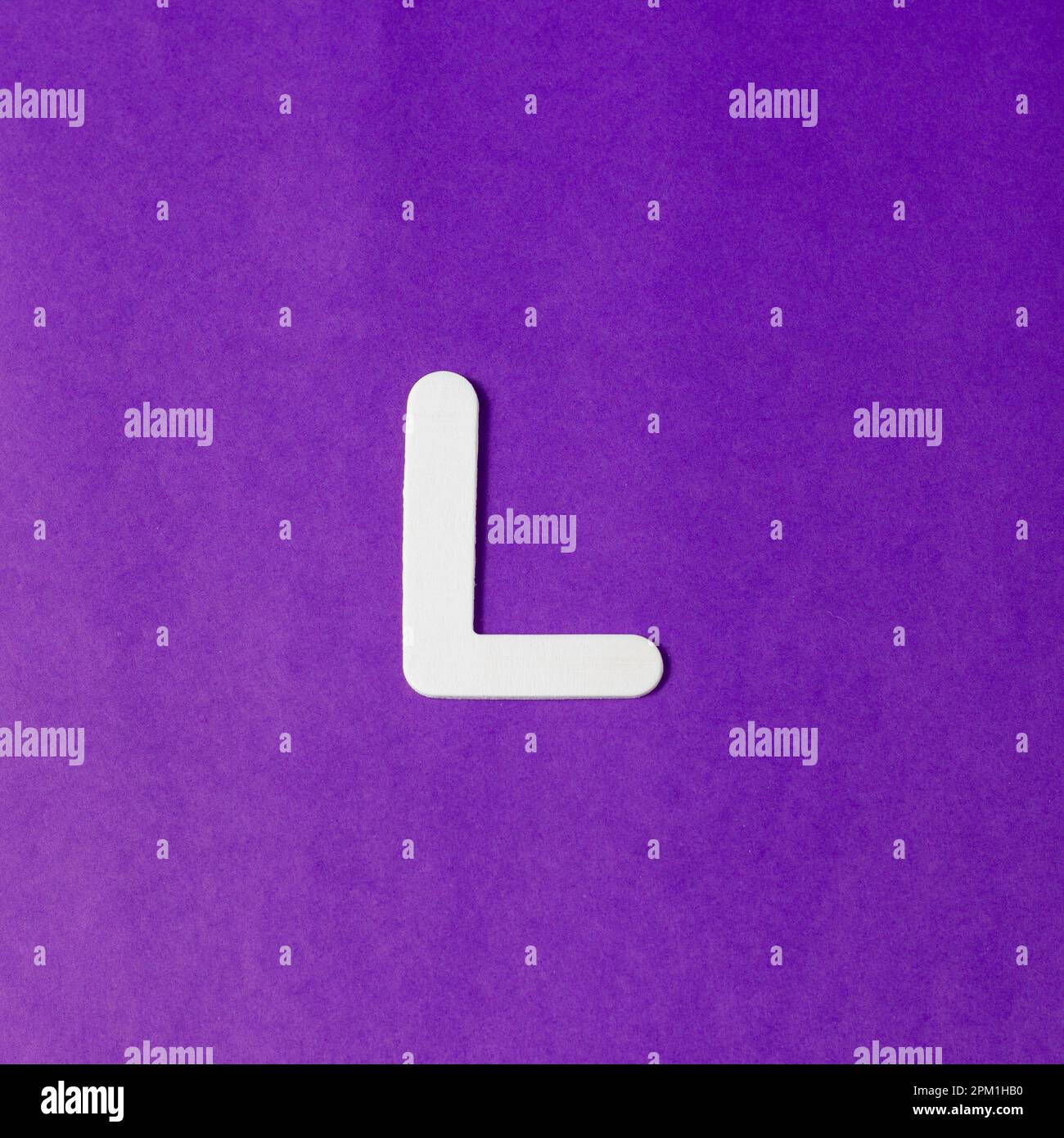 Uppercase letter L - wood texture - Purple background Stock Photo - Alamy
