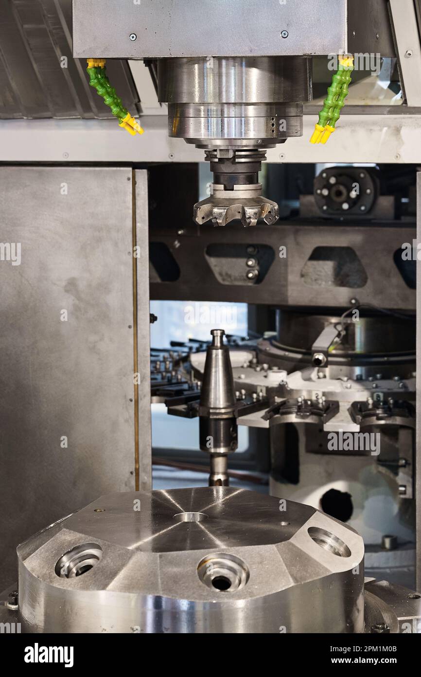 Lathe machine tool with cooling system in metalworking plant Stock ...