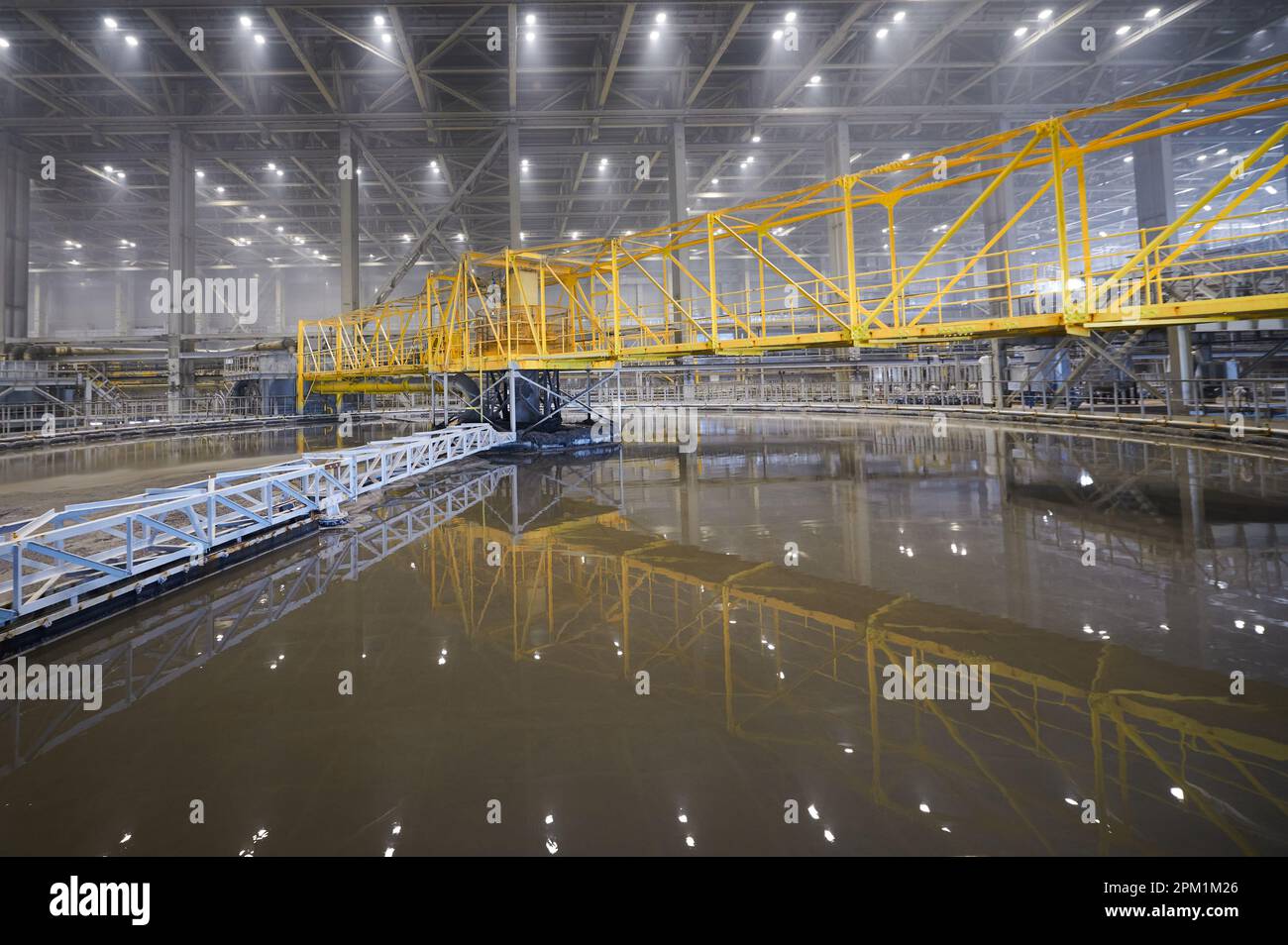 Large round floatation machine tank full of liquid at plant Stock Photo ...