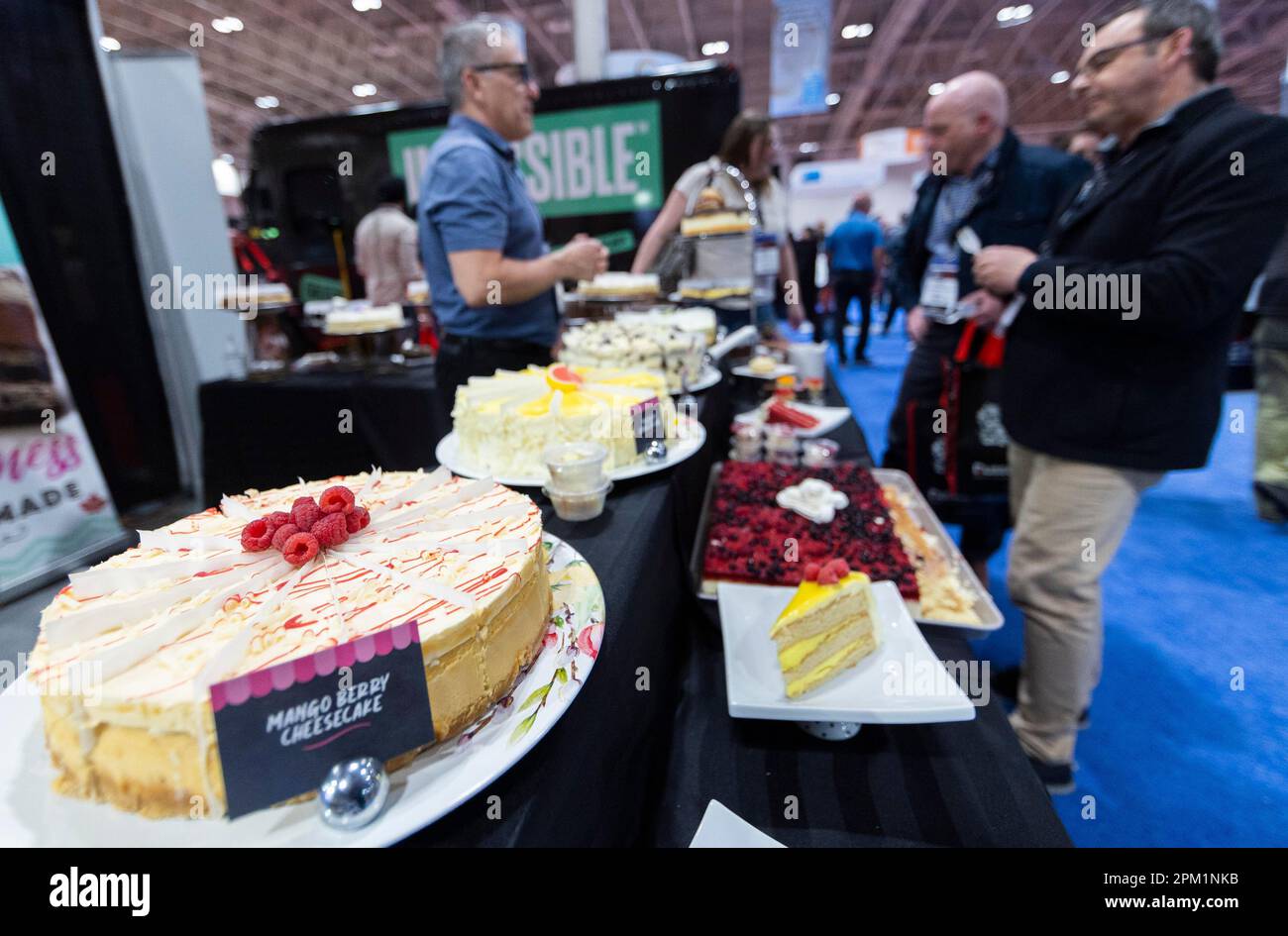 Toronto, Canada. 10th Apr, 2023. People sample food during the 2023 ...