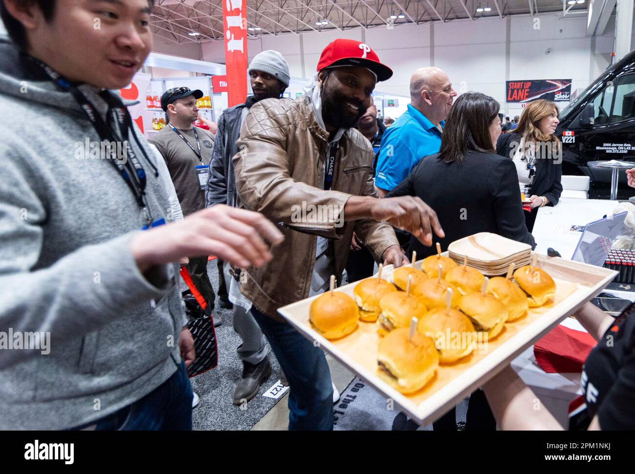 Toronto, Canada. 10th Apr, 2023. People take sample food during the ...
