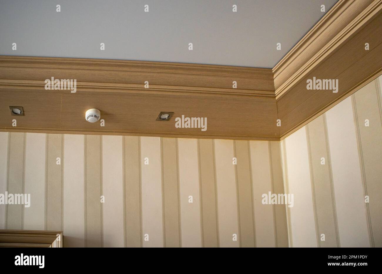 Part of the living room, corner of the wall from the ceiling, mounted ...