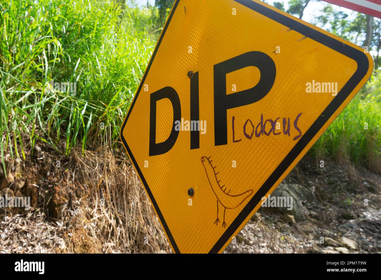 Humorous graffiti on a road sign, Australia Stock Photo - Alamy