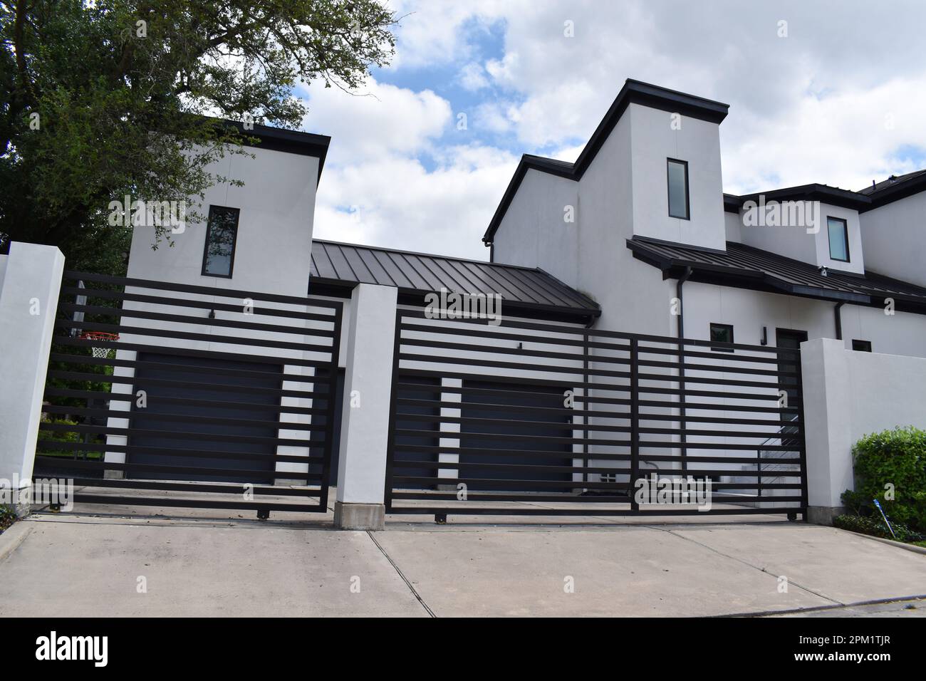 Modern home garage with car hi-res stock photography and images - Alamy