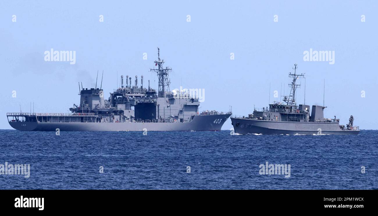 The Shishijima (L), a minesweeper vessel, and the Chihaya, a World ...