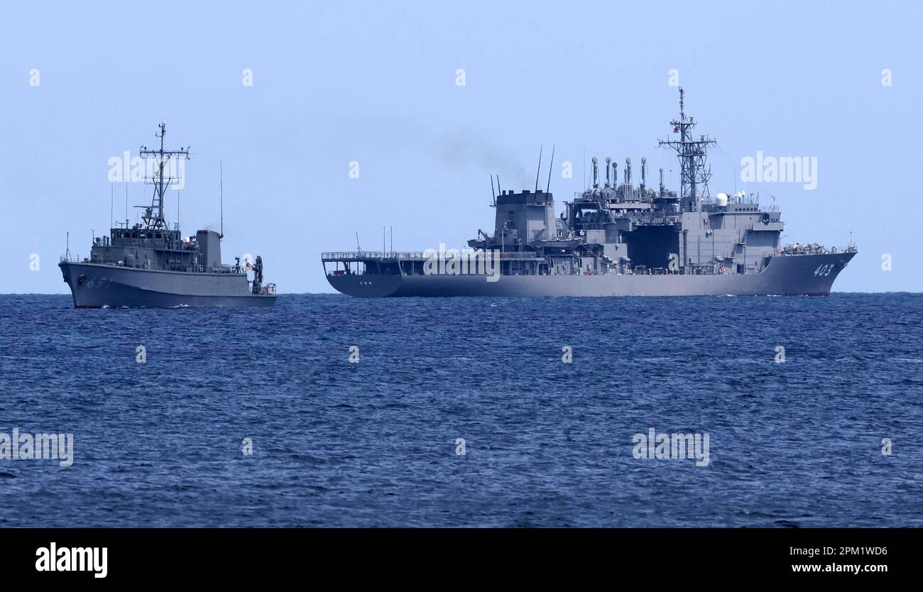 The Shishijima (R), a minesweeper vessel, and the Chihaya, a World ...