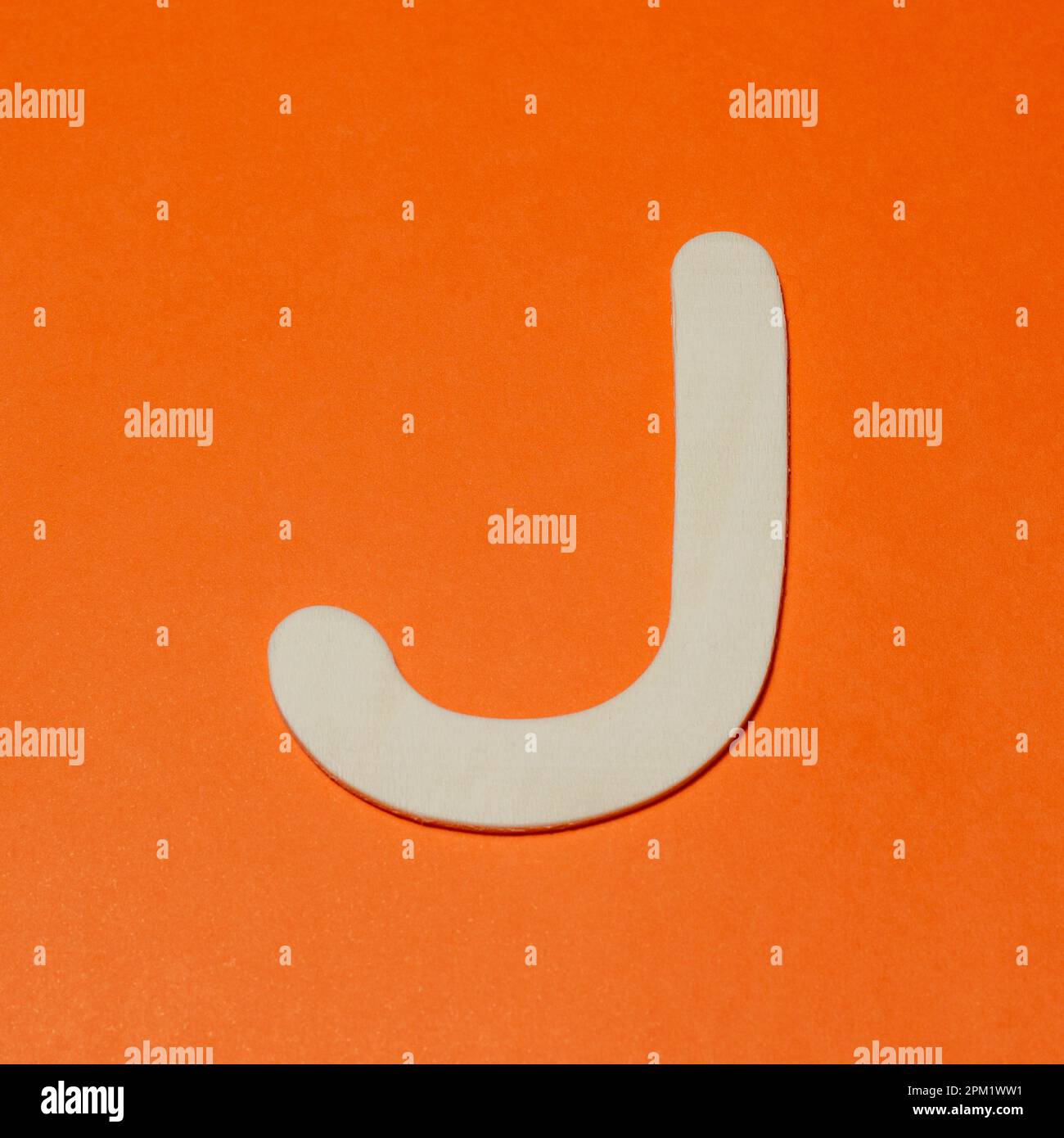 Uppercase letter J - wood texture - Orange background Stock Photo - Alamy