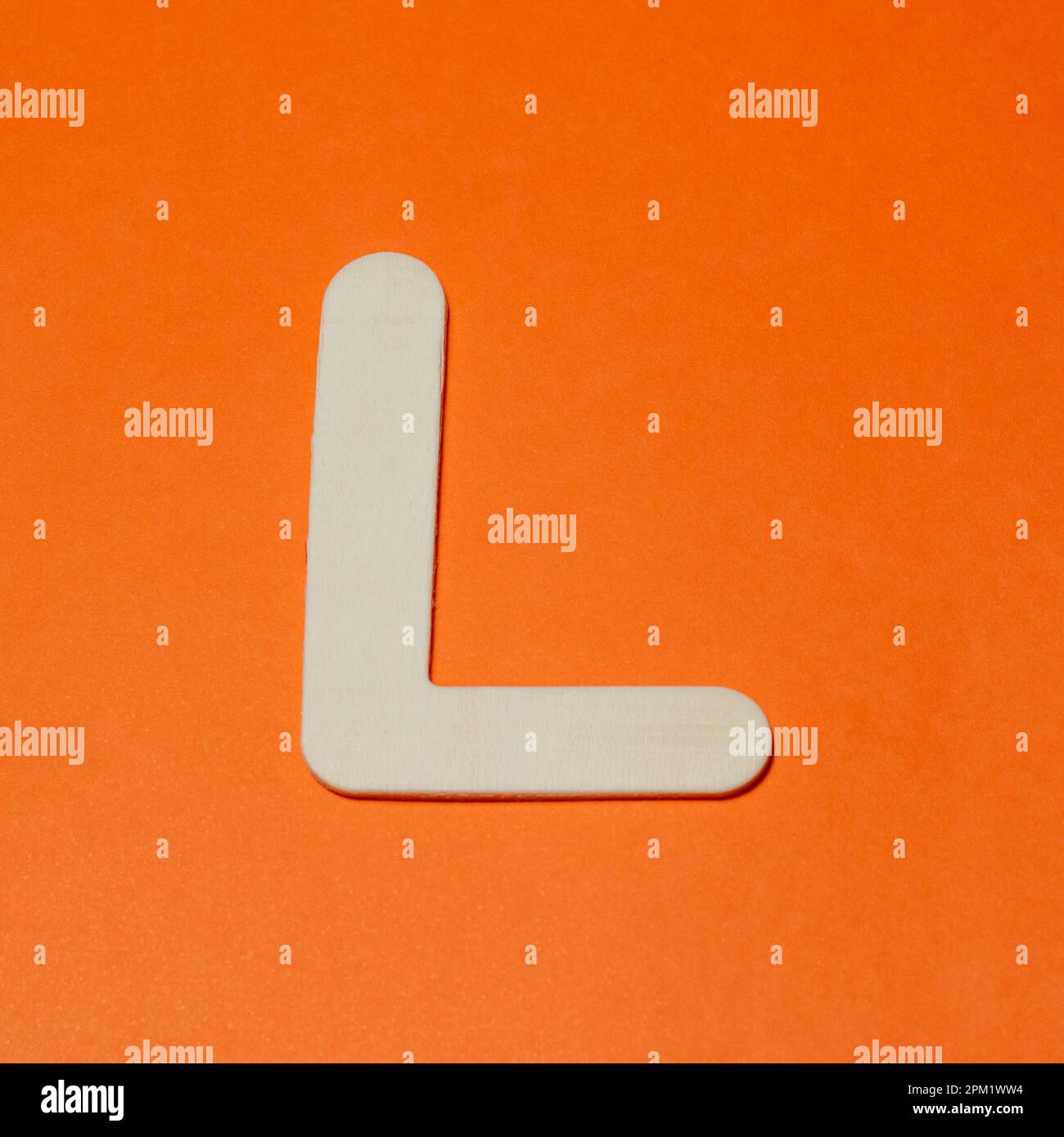 Uppercase letter L - wood texture - Orange background Stock Photo - Alamy
