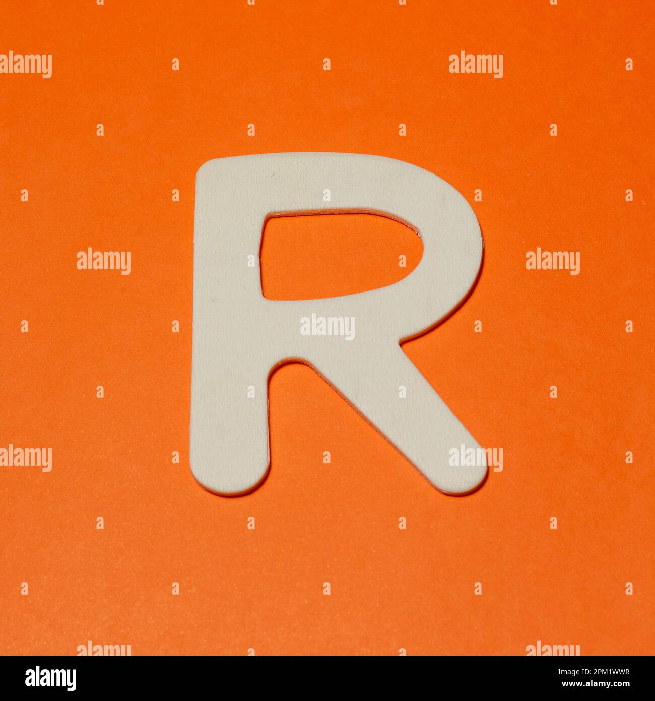 Uppercase letter R - wood texture - Orange background Stock Photo - Alamy