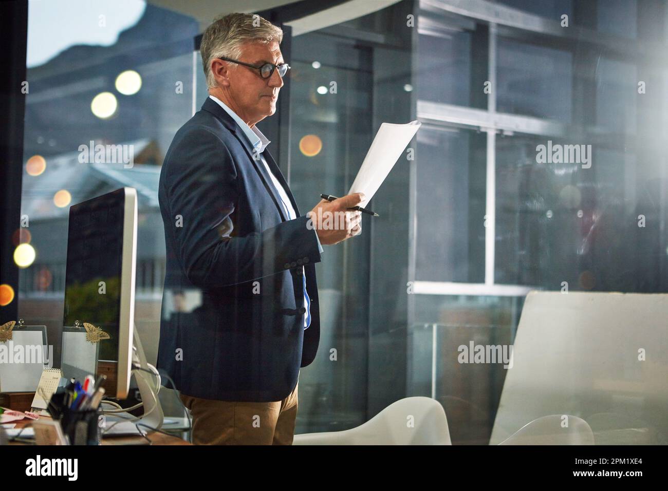 Hard work beats talent every time. a dedicated businessman working ...