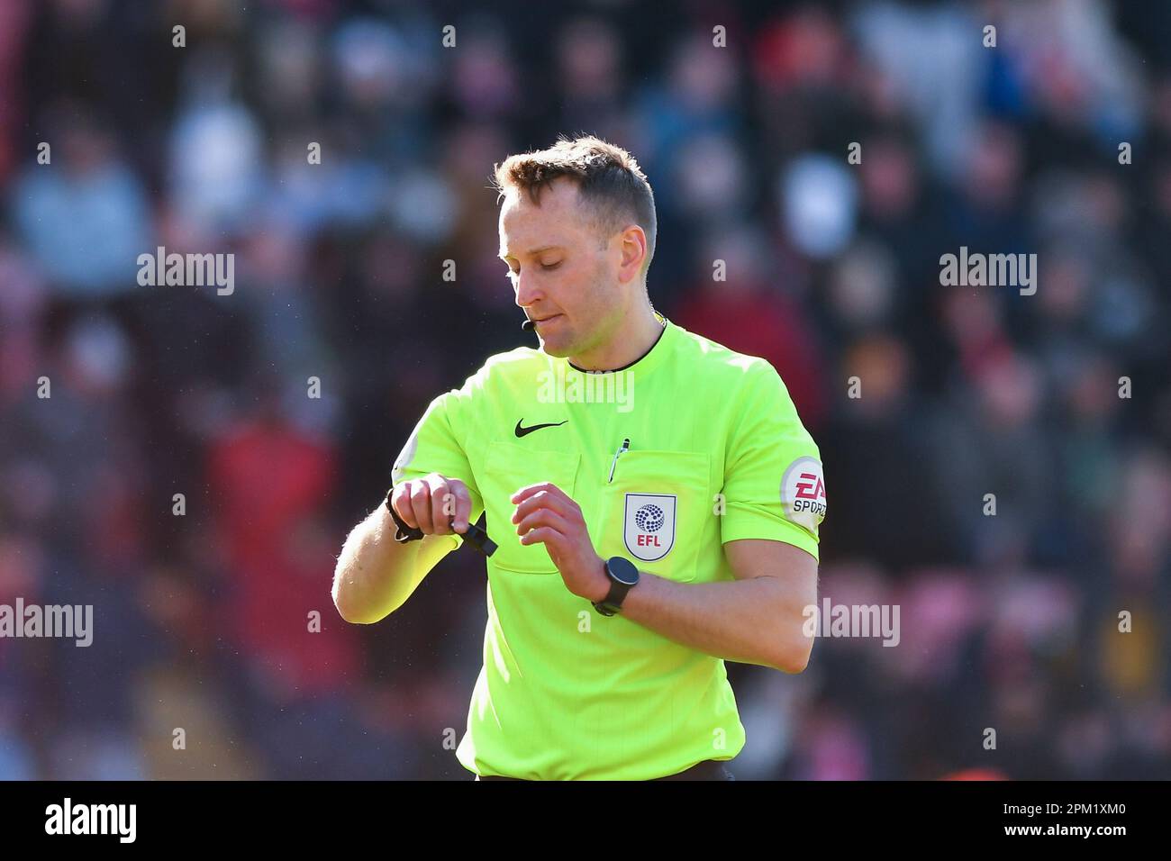 The referee James Bell in action during the Sky Bet League 2 match ...
