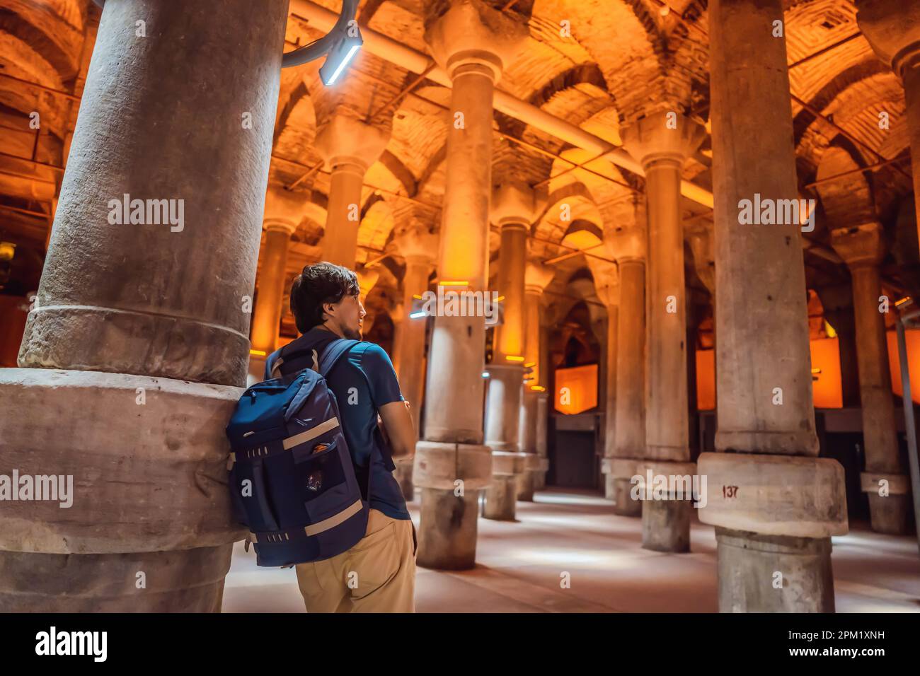 Man tourist enjoying Beautiful cistern in Istanbul. Cistern ...