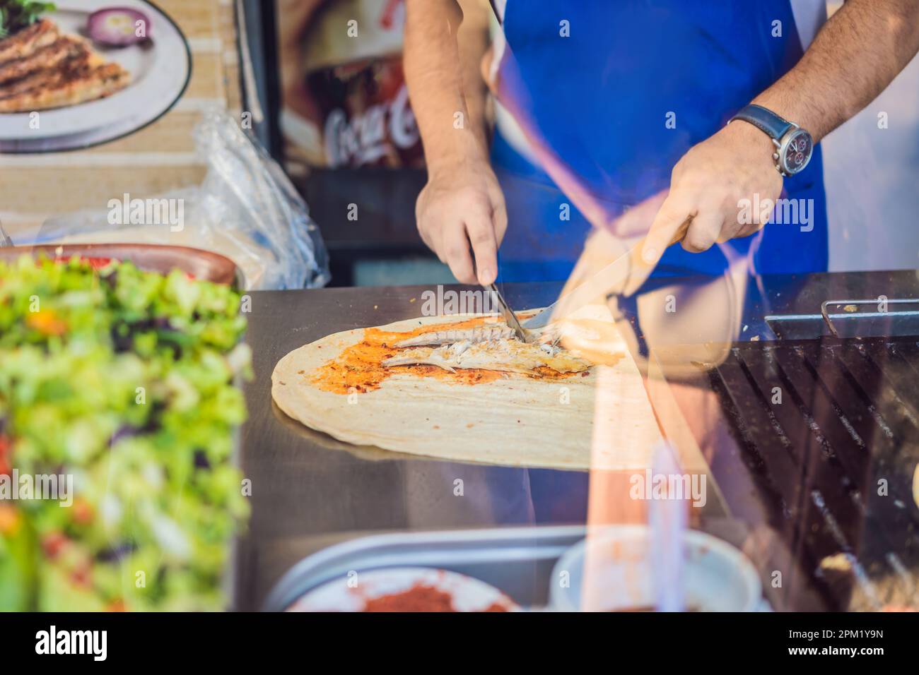 Balik ekmek - fish in a bread, traditional Turkish fast food. Istanbul ...