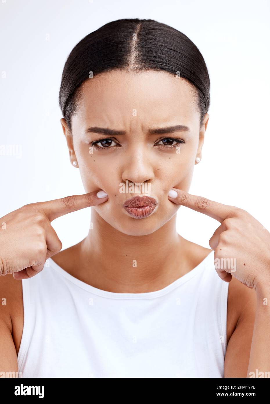Frown, portrait and woman in studio sad, disappointed and unhappy ...